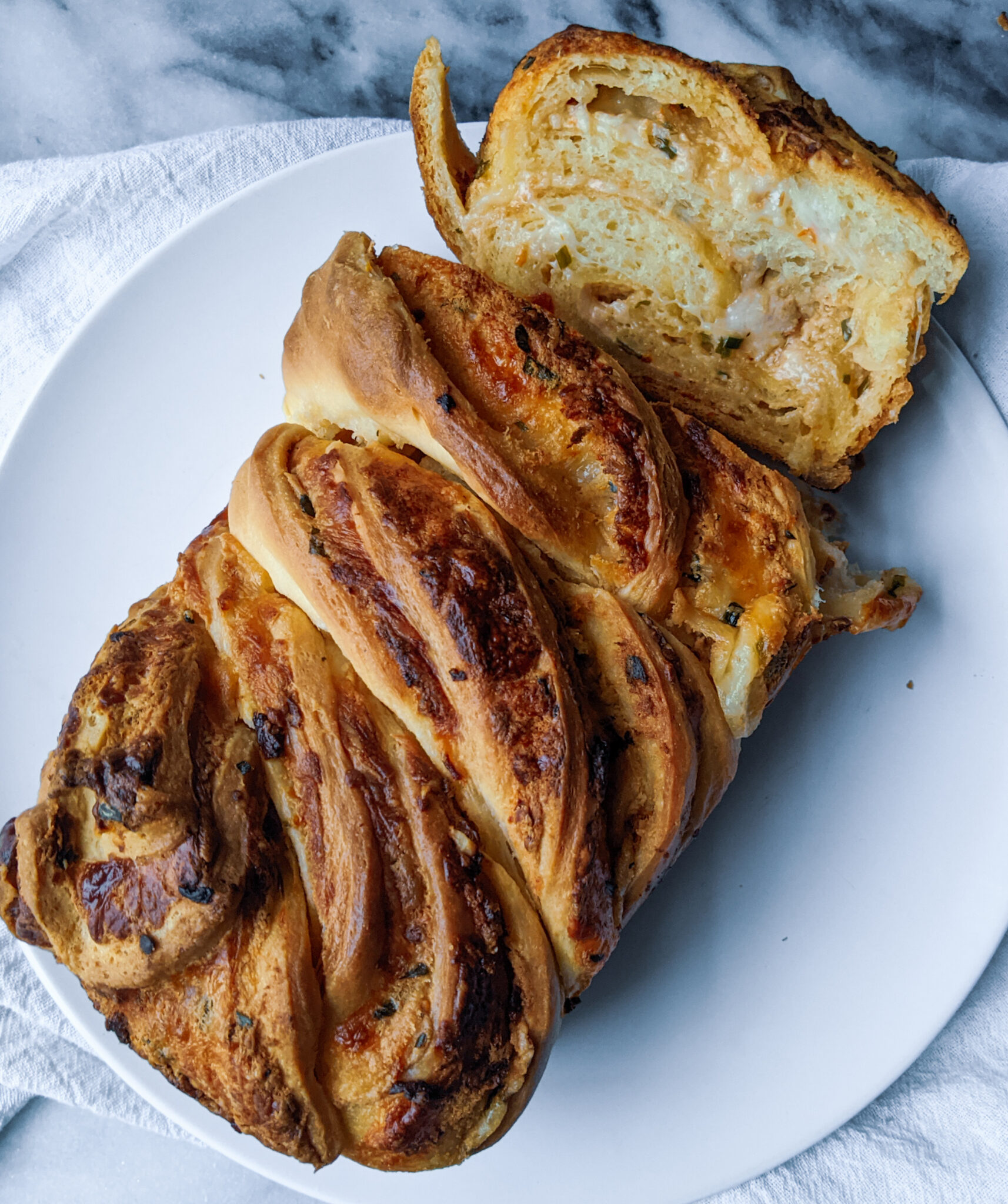 Savory Cheesy Sun-dried Tomato Babka - Courtney Made